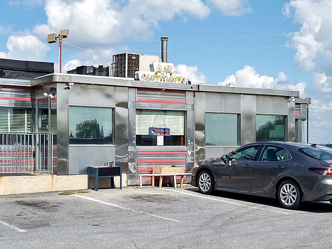 Even on cloudy days, this silver diner shines like a chrome mirage on Route 30. A roadside oasis for the hungry traveler.