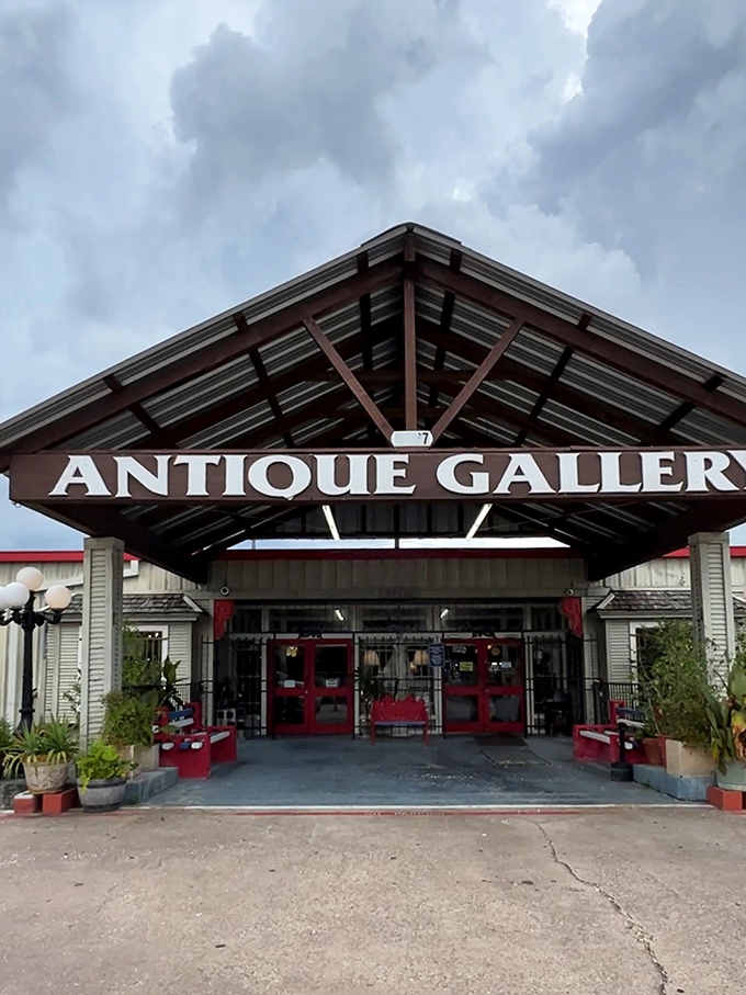 The Antique Gallery's distinctive entrance beckons under moody Texas skies&mdash;a portal to treasures waiting to be discovered.