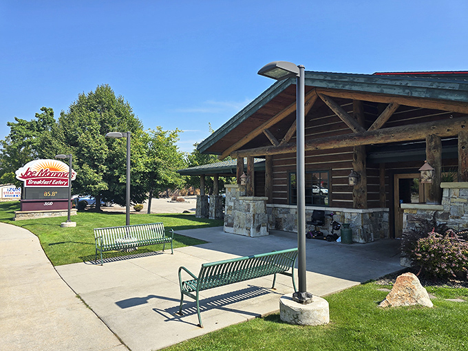 The storefront view shows Joe Momma's in its natural habitat, surrounded by greenery and promising breakfast all day.