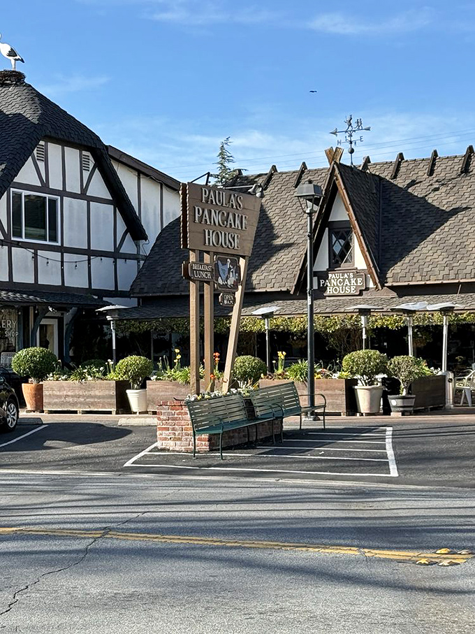 The iconic storefront announces itself with unmistakable Danish-inspired architecture. That weathervane on top isn't just decorative &ndash; it's pointing toward pancake paradise.