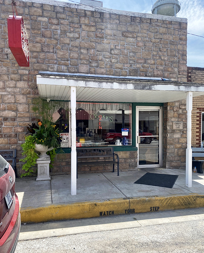 Watch Your Step warns the curb outside Cooky's—sound advice before entering a place where you'll likely leave considerably heavier than you arrived.