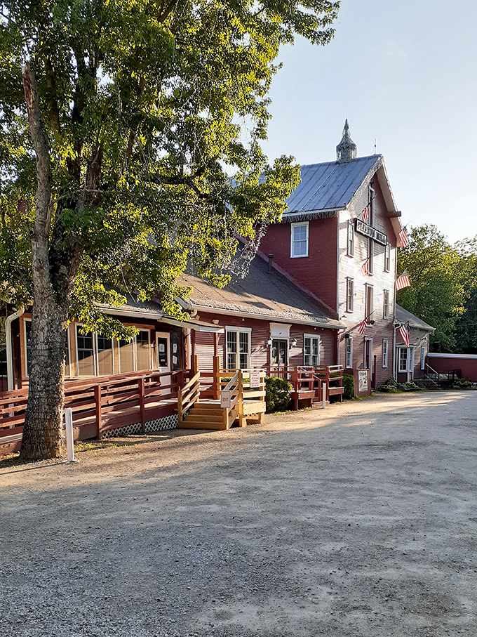 The full majesty of Clifton Mill reveals itself at golden hour. This isn't just a restaurant—it's a postcard come to life.
