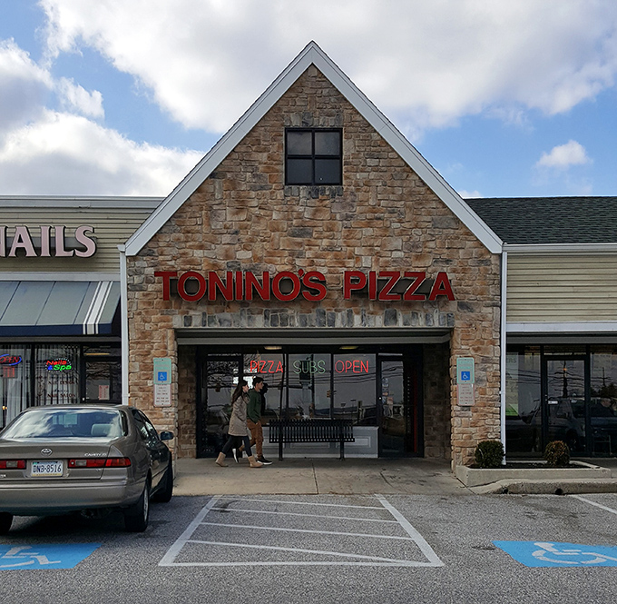 The entrance to Tonino's isn't just a doorway; it's a portal to a world where comfort food reigns supreme and hunger doesn't stand a chance.