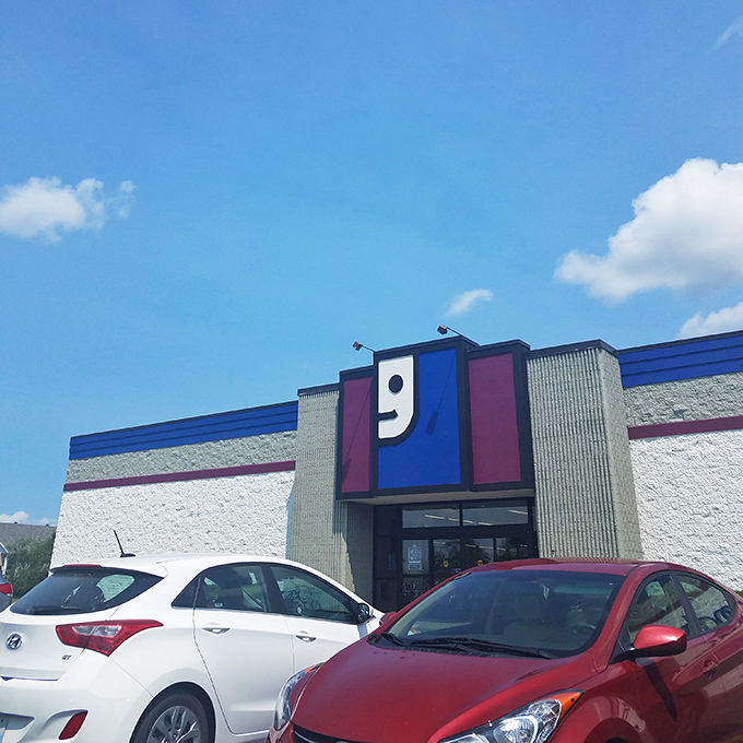 The iconic blue and purple storefront beckons like a retail lighthouse, guiding bargain hunters safely to shore through seas of full-price temptation.