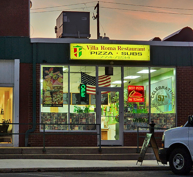 As evening falls, Villa Roma's glow becomes a beacon for the hungry, promising refuge from cooking and comfort for the soul.