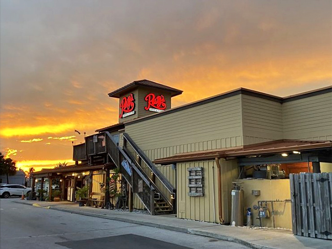 Sunset casts a golden glow on Rusty's – nature's way of highlighting one of Cape Canaveral's most beloved dining destinations.