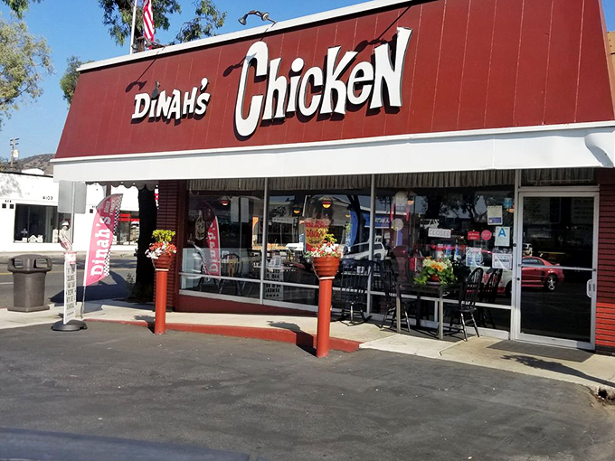 The siren call of that bold red storefront with "Dinah's Chicken" emblazoned across the top. Like a beacon of comfort food goodness in a sea of trendy eateries.