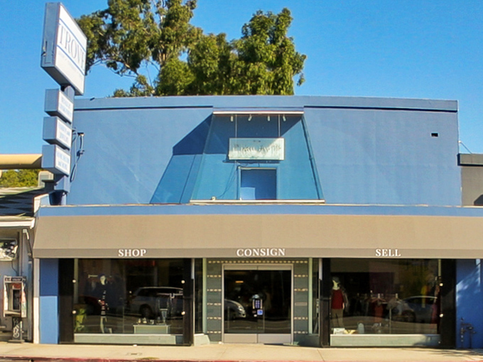 Blue heaven storefront: TROVE's unassuming exterior belies the wonderland of secondhand treasures waiting inside, like a speakeasy for sustainable shopping.