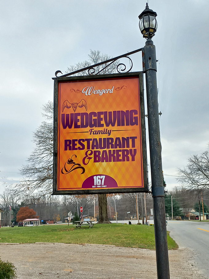 The sign that's guided hungry travelers for years. Orange and purple never looked so appetizing&mdash;or so promising.