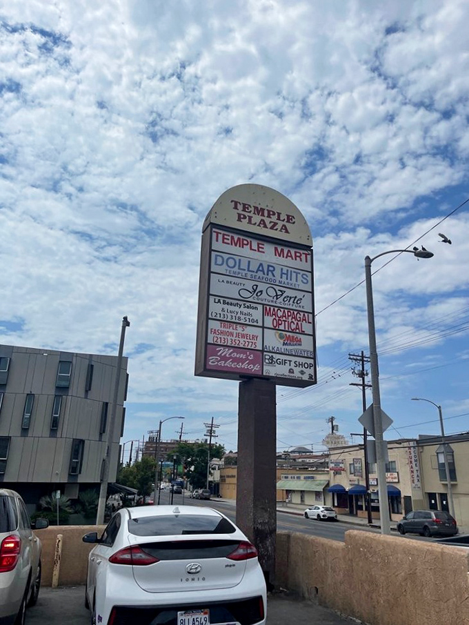 Even the street sign knows what's up &ndash; Dollar Hits gets top billing at Temple Plaza because flavor this good deserves marquee status.