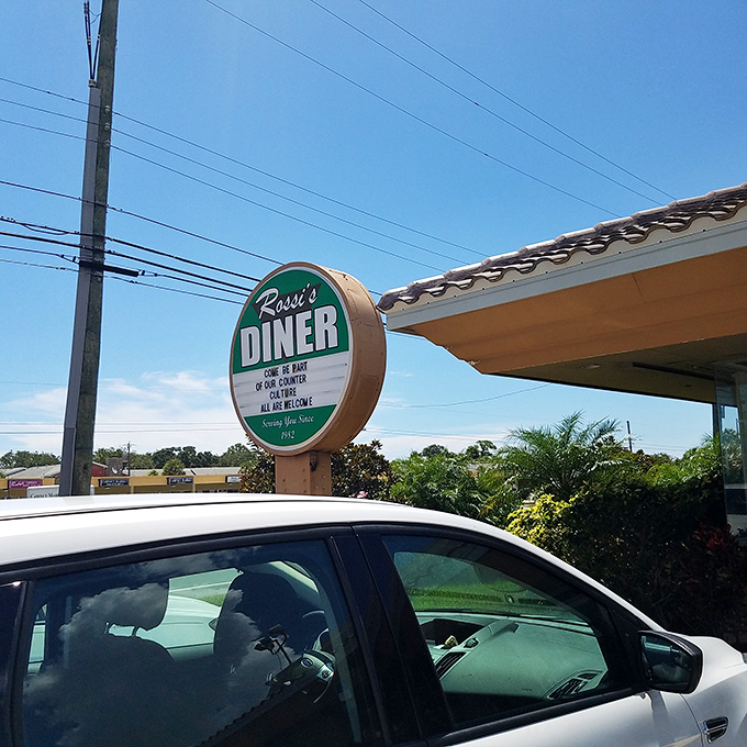 The sign that's guided hungry travelers like a culinary lighthouse. "Dine in or counter service" &ndash; six words that promise salvation for empty stomachs.