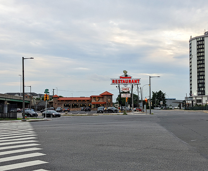 A landmark on the landscape. Penrose Diner stands proudly against the Philadelphia skyline, a testament to the enduring appeal of honest, delicious food.