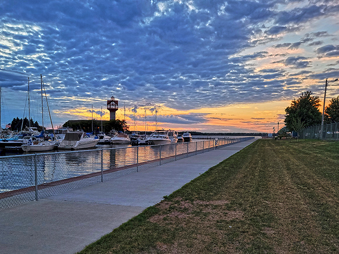 Sunset over Erie's marina paints the sky in colors no artist could charge enough for. The daily show that makes living on a fixed income feel like luxury. 