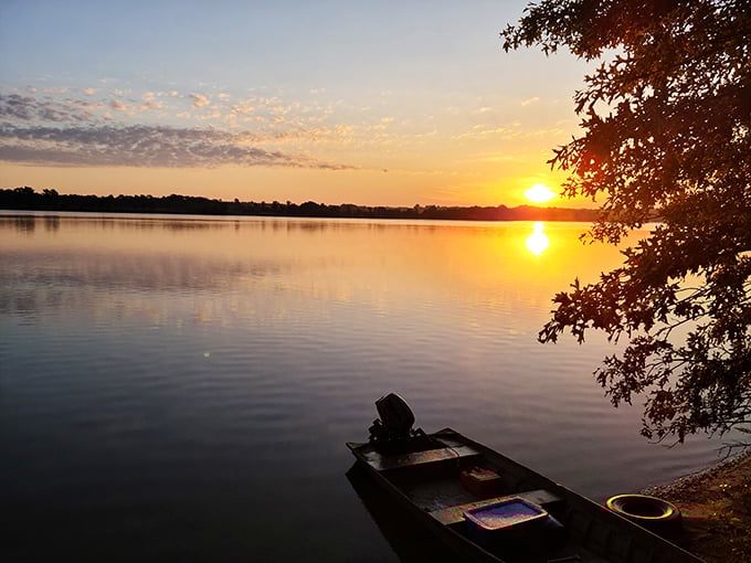 As the sun bids farewell, Long Branch Lake transforms into liquid gold&mdash;proof that the best light show doesn't require tickets.
