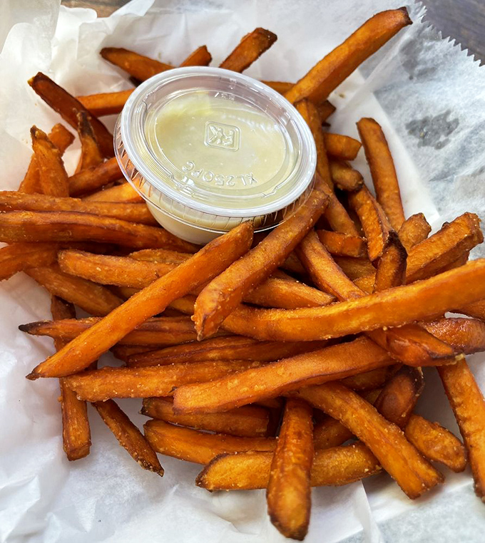 Sweet potato fries with a side of heaven&mdash;crispy, sweet, and the perfect companion to anything from the sea.