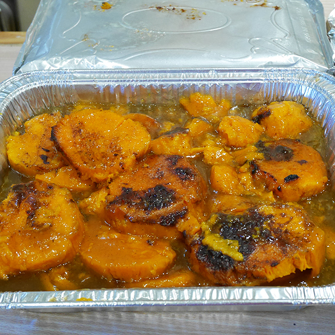 These candied sweet potatoes shimmer with sweet syrupy goodness, a side dish so good it threatens to upstage everything else on your plate.