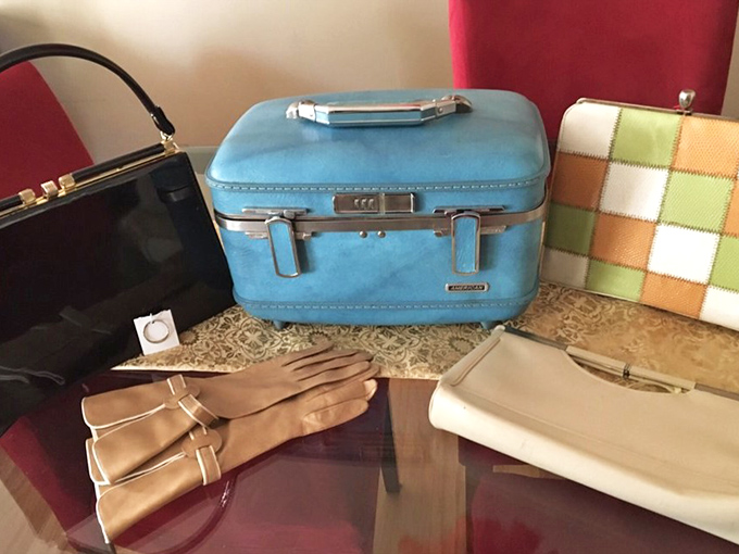 The accessories that made travel glamorous before rolling suitcases and neck pillows. That blue train case screams "I'm flying Pan Am in 1962!"