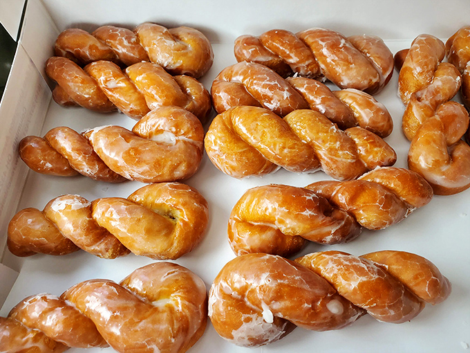 Twisted donuts that have caused more spontaneous joy than a surprise tax refund. Golden, glazed, and gone in sixty seconds.