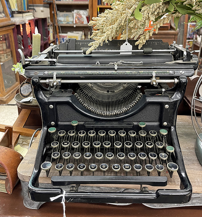 An old typewriter sitting patiently, probably containing more stories than any modern laptop could handle.
