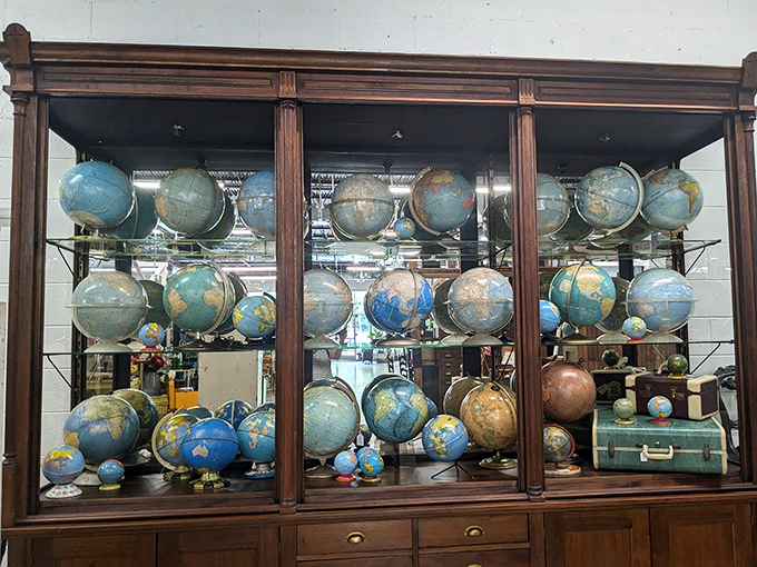 A cabinet of vintage globes where you can find countries that don't exist anymore&mdash;geography lessons with a side of nostalgia.