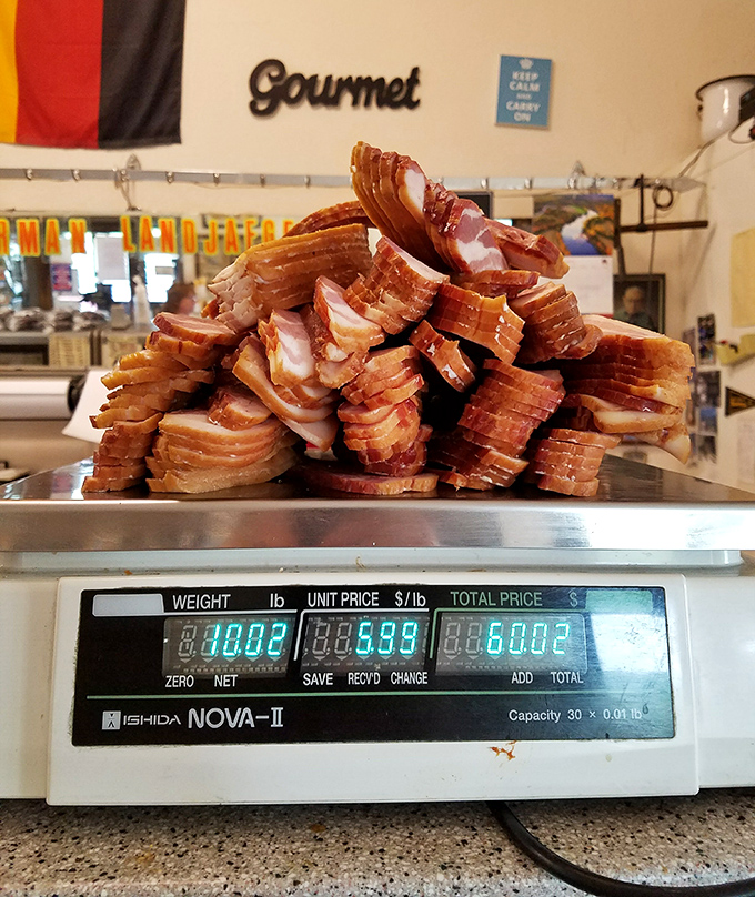 Sliced ham stacked like the pages of a delicious novel you can't put down. Each layer tells a story of smoke, patience, and tradition.