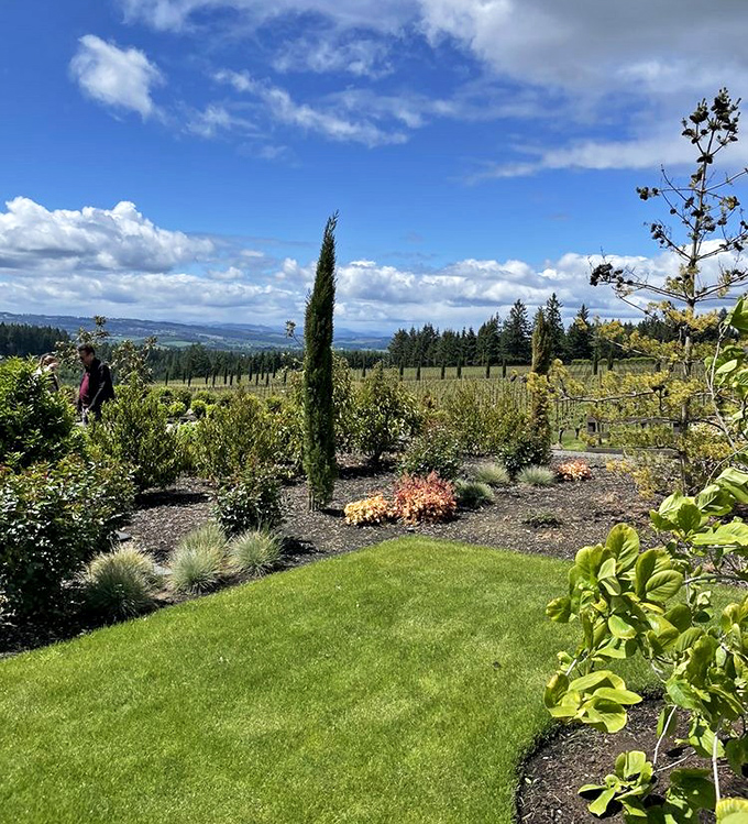 Manicured gardens complement vineyard views, creating picture-perfect settings for memorable wine country visits.