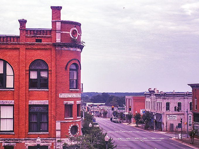 Classic red brick buildings stand like proud sentinels, whispering tales of Georgia's golden railroad days.