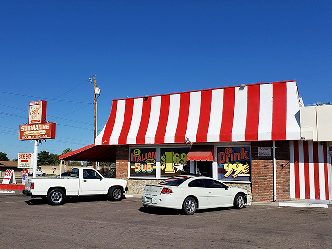 That red and white striped awning screams "submarine sandwiches ahead" louder than a carnival barker.