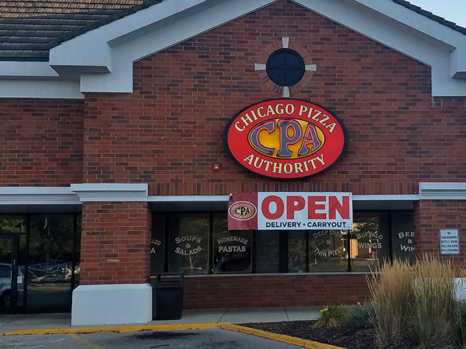 That brick facade promises serious pizza business &ndash; like a fortress protecting cheesy treasures inside.