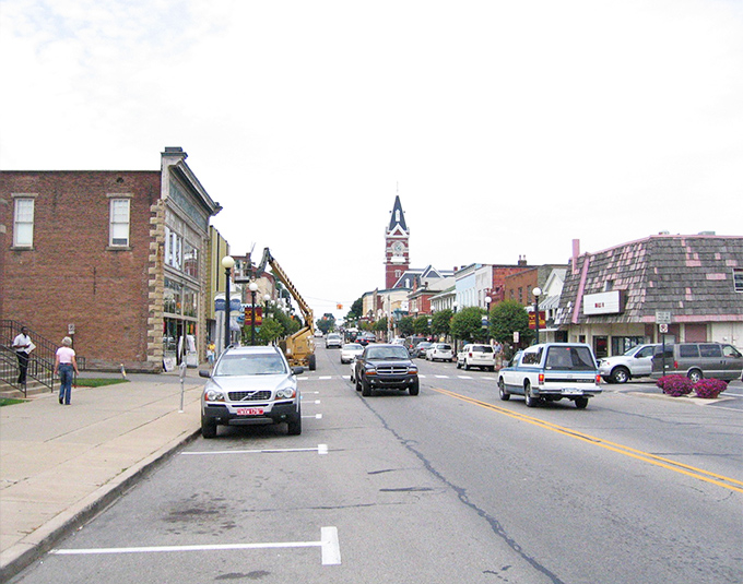 Main Street magic happens here - where every storefront whispers tales of simpler times and stronger coffee.