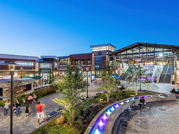 Twilight transforms Clarksburg Premium Outlets into a glowing shopping village. Those purple LED lights make bargain-hunting feel like a special occasion!