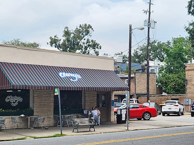 That striped awning beckons like a lighthouse for hungry souls seeking Savannah's breakfast treasures.