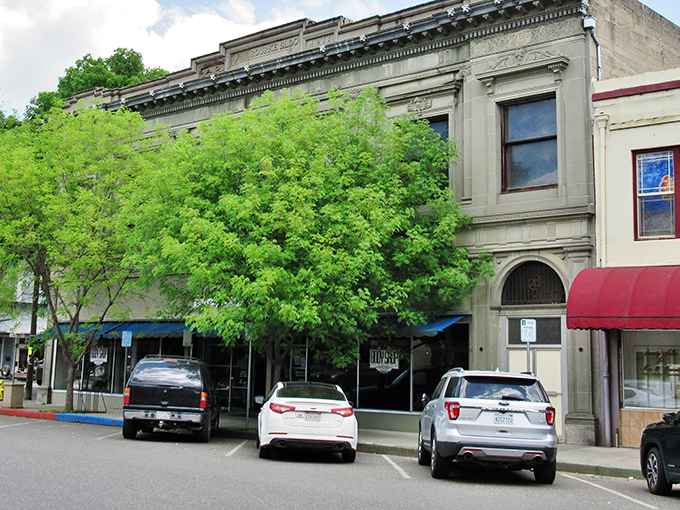 The stately old building in Colusa is a true architectural gem, with plenty of shade from the trees.