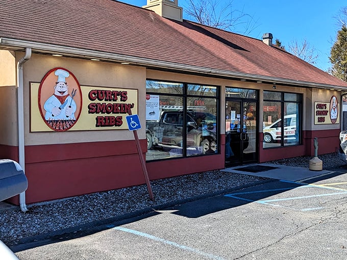 That cheerful chef logo promises serious barbecue magic happening behind those welcoming windows.