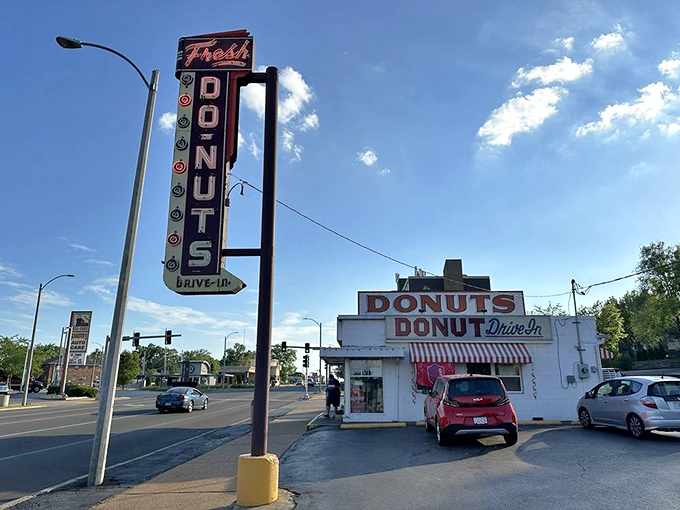 The iconic neon sign at Donut Drive In beckons like a lighthouse for the sweet-toothed sailors of St. Louis.