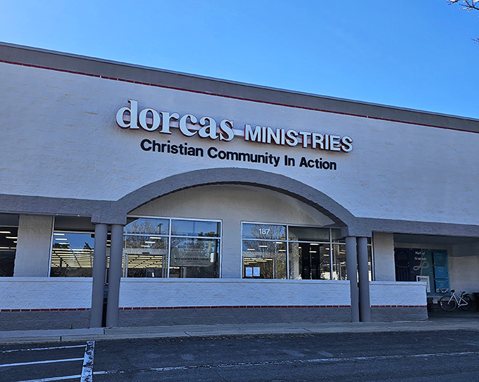 Look at that pristine storefront - Dorcas Thrift Shop welcomes bargain hunters with open arms and organized aisles.