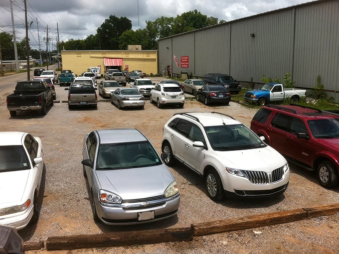 Cars packed tighter than sardines - this parking lot screams "treasure hunting jackpot ahead!"