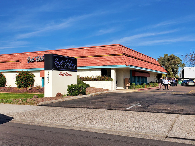Fast Eddie's classic red-roofed exterior promises comfort food that'll make your taste buds do a happy dance.