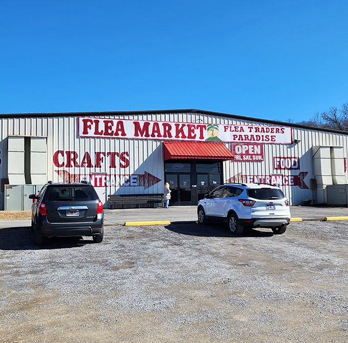 That bright red "FLEA MARKET" sign practically shouts "treasures inside!" from the parking lot.