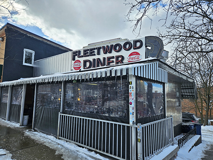 That classic chrome gleam against winter snow - pure diner poetry that makes your heart skip.