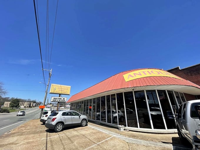 The iconic red roof of Goodlettsville Antique Mall beckons treasure hunters like a vintage lighthouse guiding ships to shore.