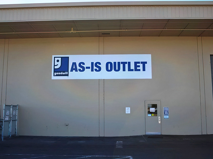 The unassuming exterior of Goodwill's As-Is Outlet hides a treasure hunter's paradise inside.