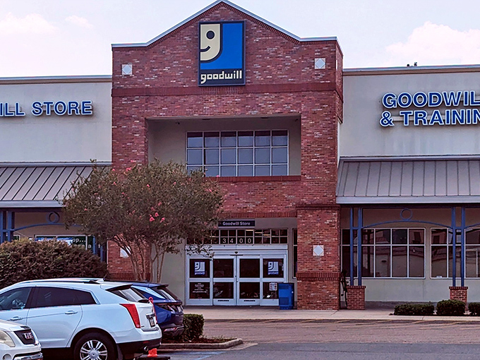 The brick facade of Goodwill's Tulane Avenue location promises treasure hunting adventures behind those smiling blue doors.