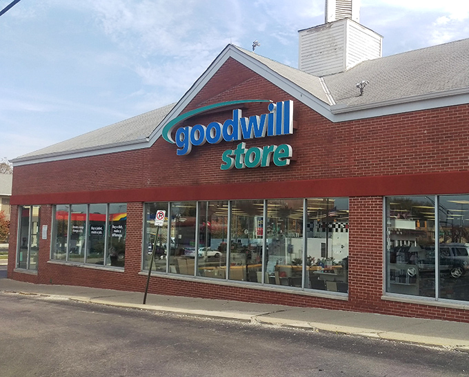 That familiar blue and red Goodwill sign promises treasure hunting adventures inside this welcoming Columbus storefront.