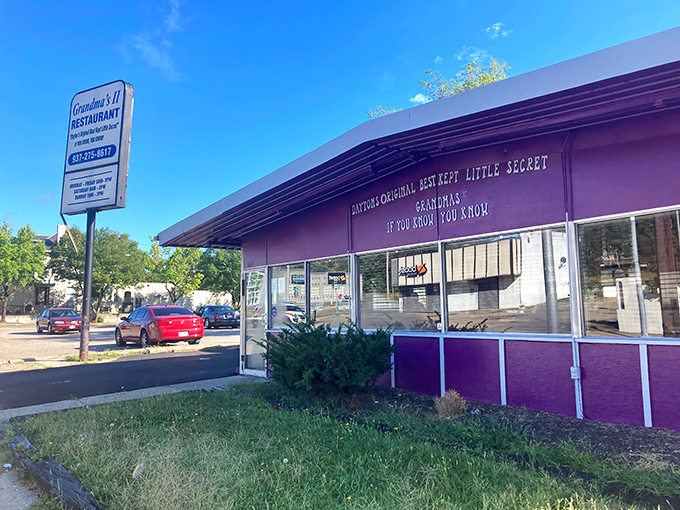 The purple exterior of Grandma's II Restaurant stands out like a beacon of comfort food in Dayton. That sign promises secrets worth discovering!