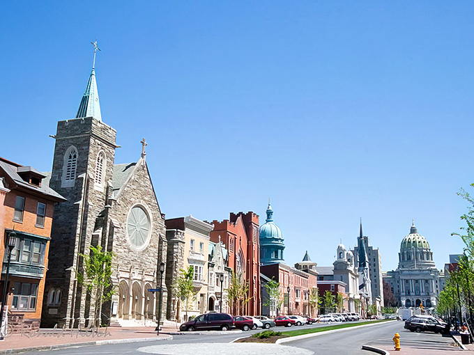 Harrisburg's State Capitol dome gleams like Pennsylvania's crown jewel against a perfect blue sky.