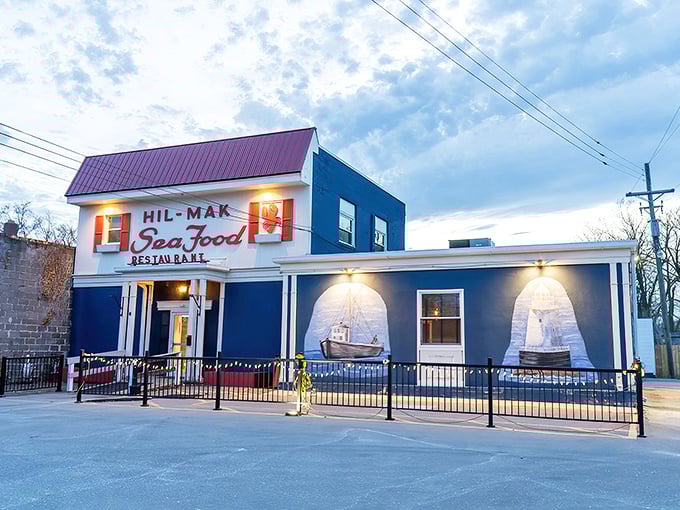 Sometimes the best treasures hide behind the most unassuming facades, like this charming blue seafood haven.