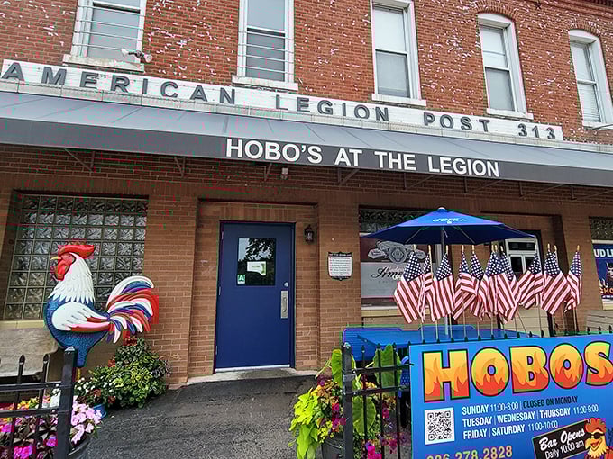 The American Legion exterior hides a fried chicken paradise. Hobo's colorful rooster mascot promises clucking good meals inside!