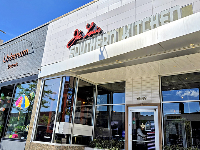 The gleaming white facade of Joe Louis Southern Kitchen promises Southern comfort in the heart of Detroit. Crispy chicken awaits inside!