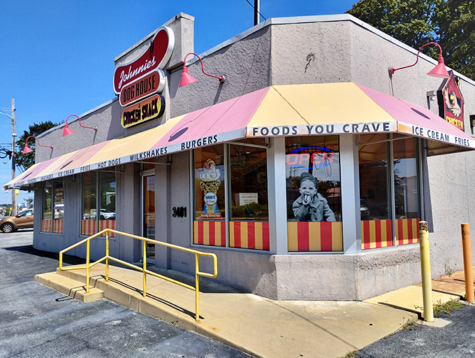 Johnnie's Dog House beckons with its cheerful awning &ndash; a time capsule of comfort food where calories don't count and memories are made.